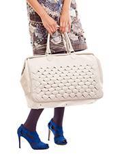 The Problem with Your Purse: Bad Knees, Elbow, Neck and Spine - McLeod ...